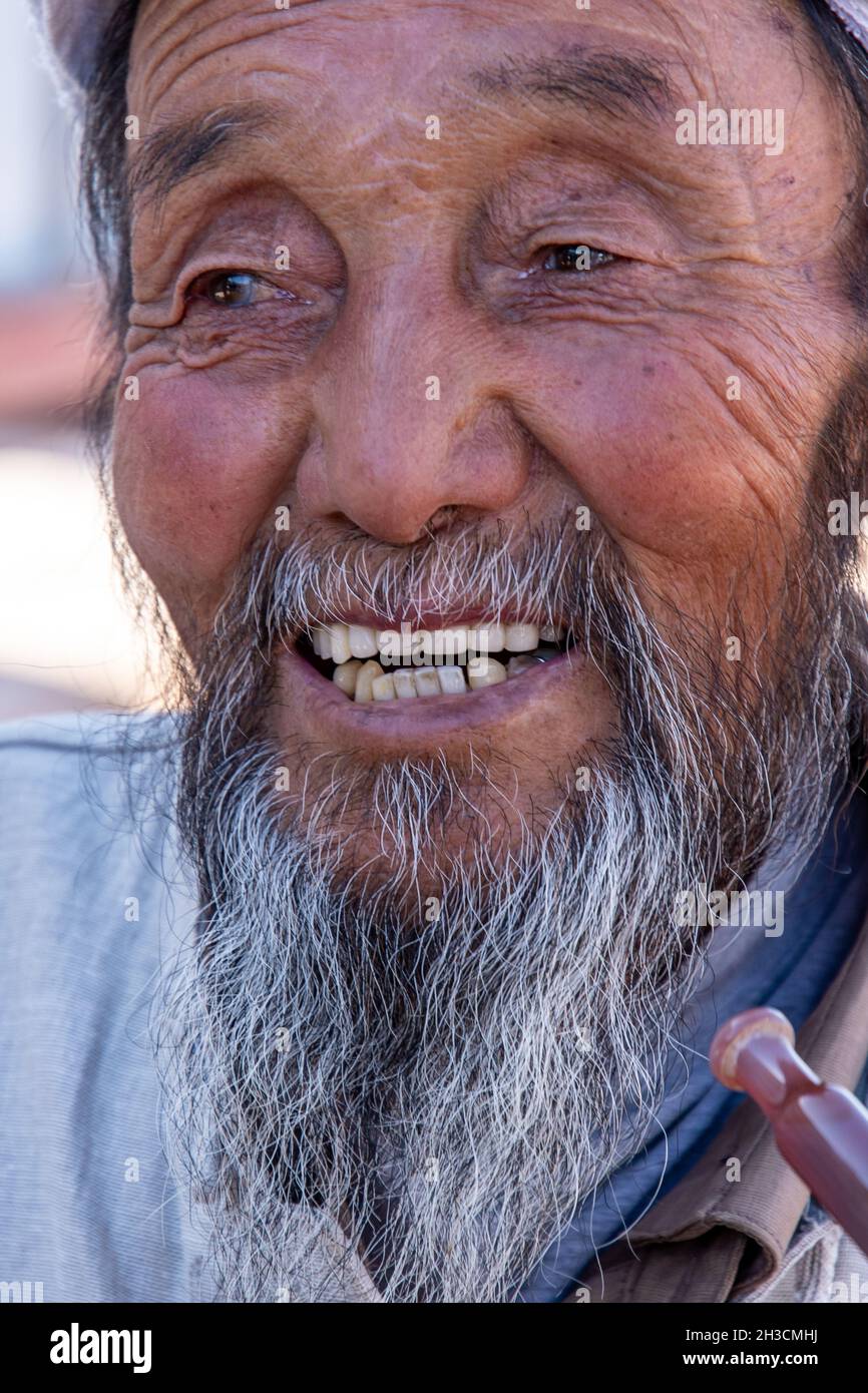 Elder Chinese man with turban at Jingbian, China Stock Photo - Alamy