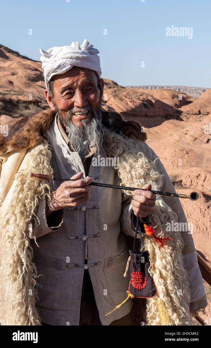 Elder Chinese man with turban at Jingbian, China Stock Photo - Alamy