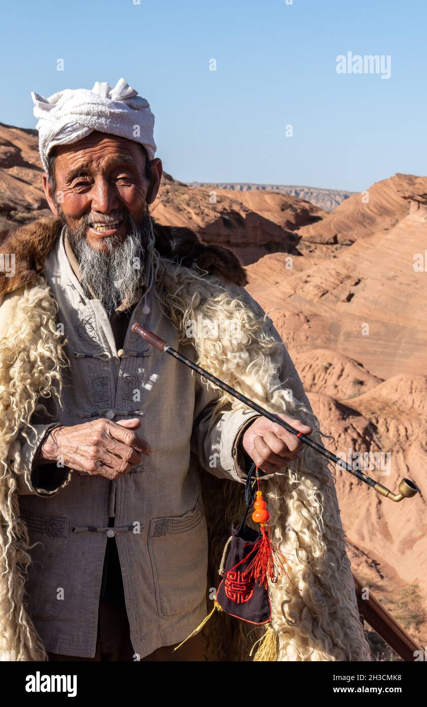 Elder Chinese man with turban at Jingbian, China Stock Photo - Alamy