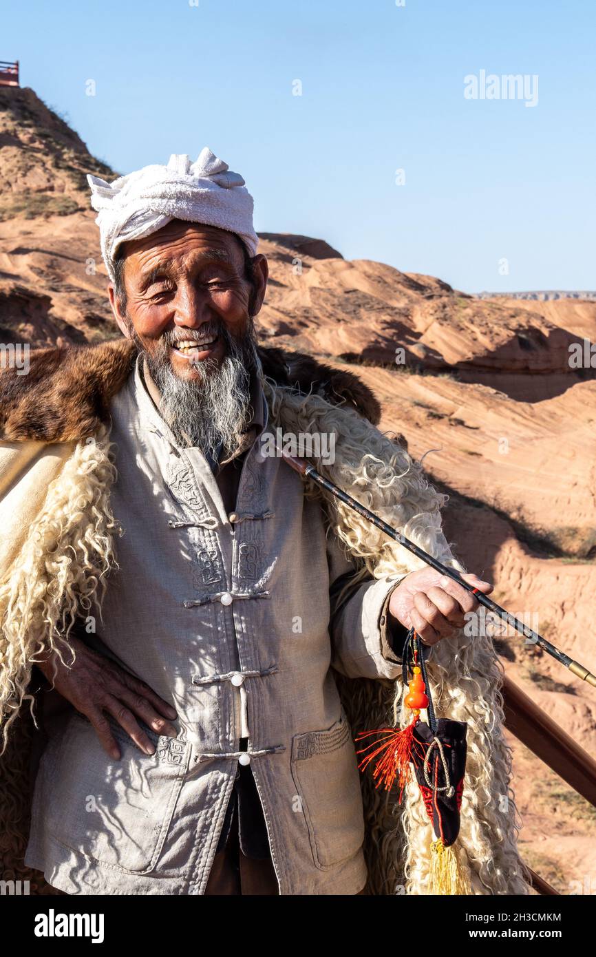 Elder Chinese man with turban at Jingbian, China Stock Photo - Alamy