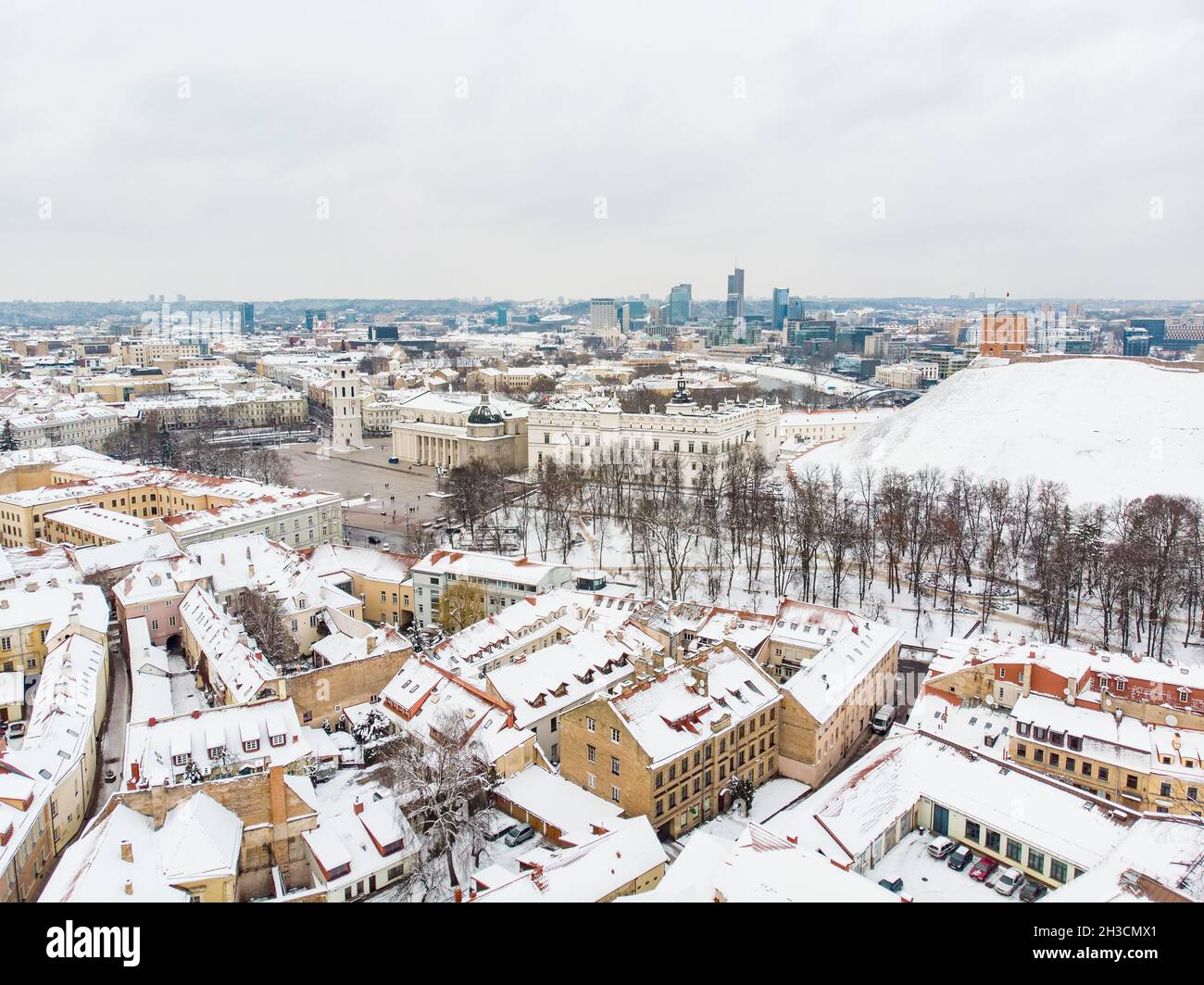 Beautiful Vilnius city panorama in winter with snow covered houses ...