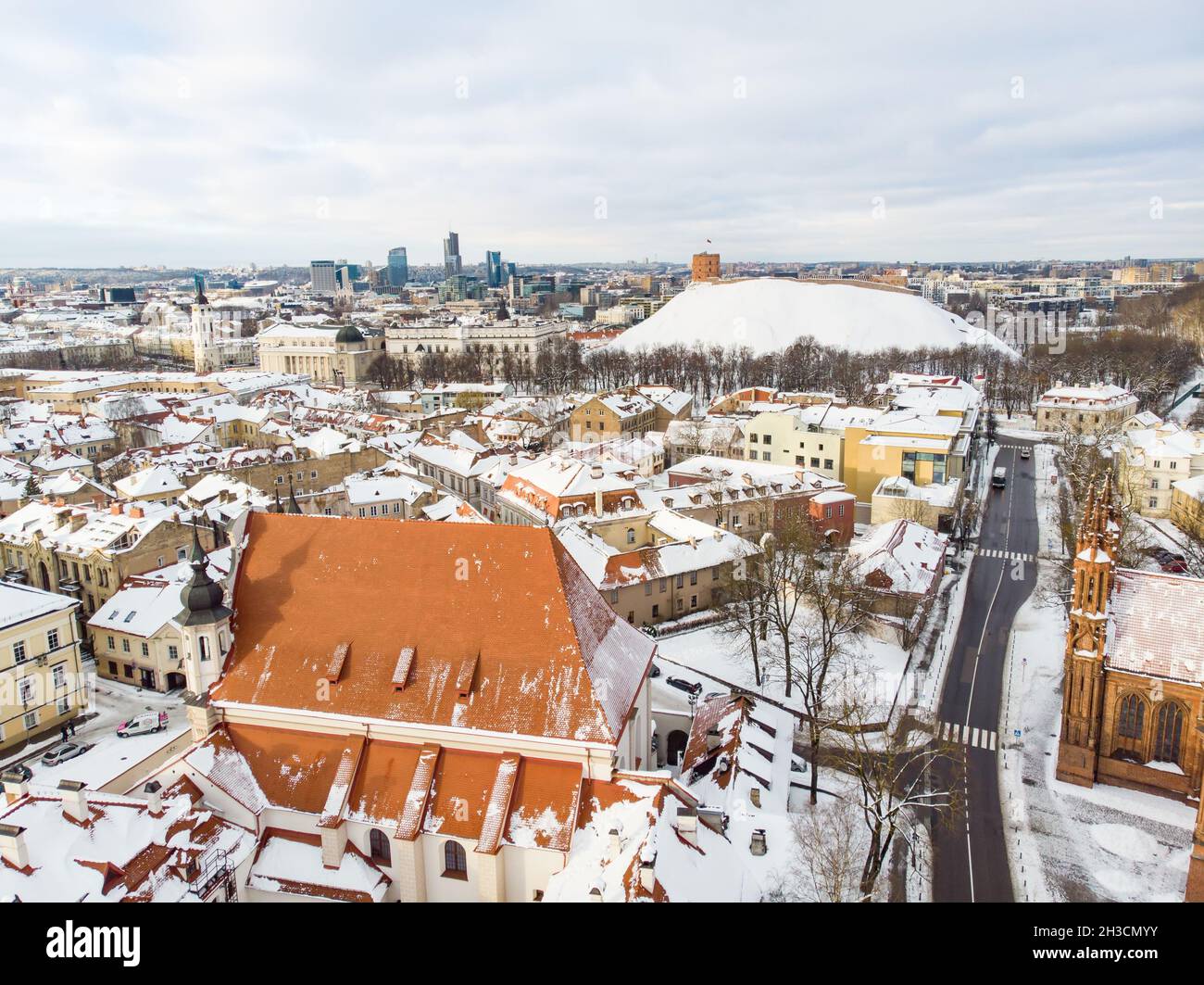 Beautiful Vilnius city panorama in winter with snow covered houses ...