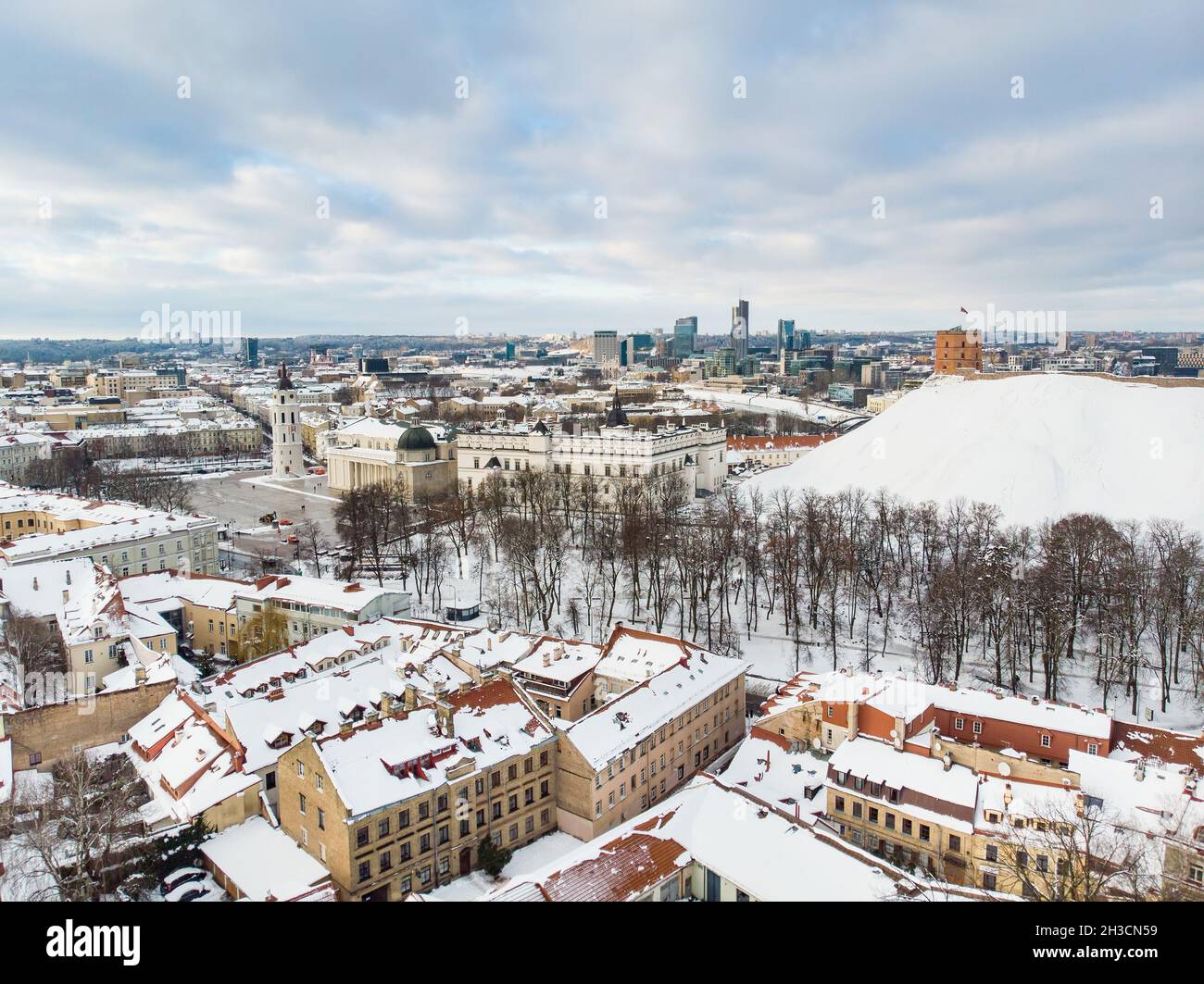 Beautiful Vilnius city panorama in winter with snow covered houses ...