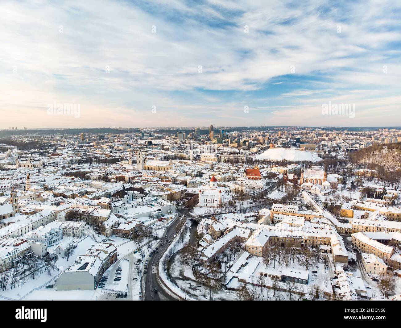Beautiful Vilnius city panorama in winter with snow covered houses ...
