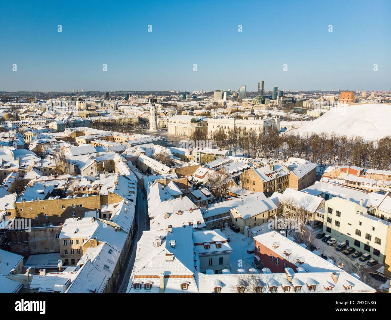 Beautiful Vilnius city panorama in winter with snow covered houses ...