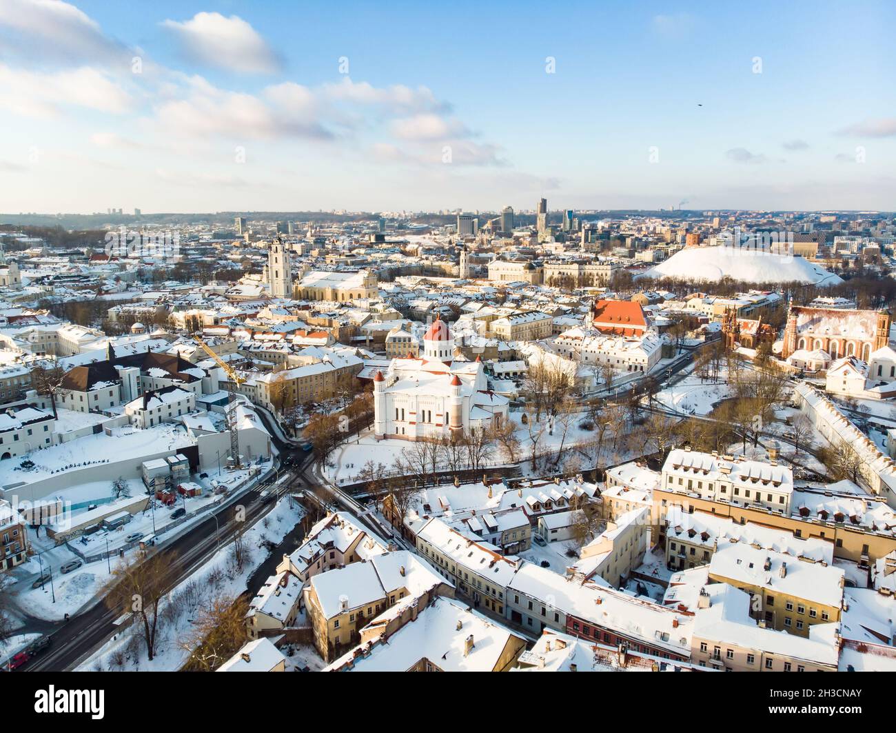 Beautiful Vilnius city panorama in winter with snow covered houses ...