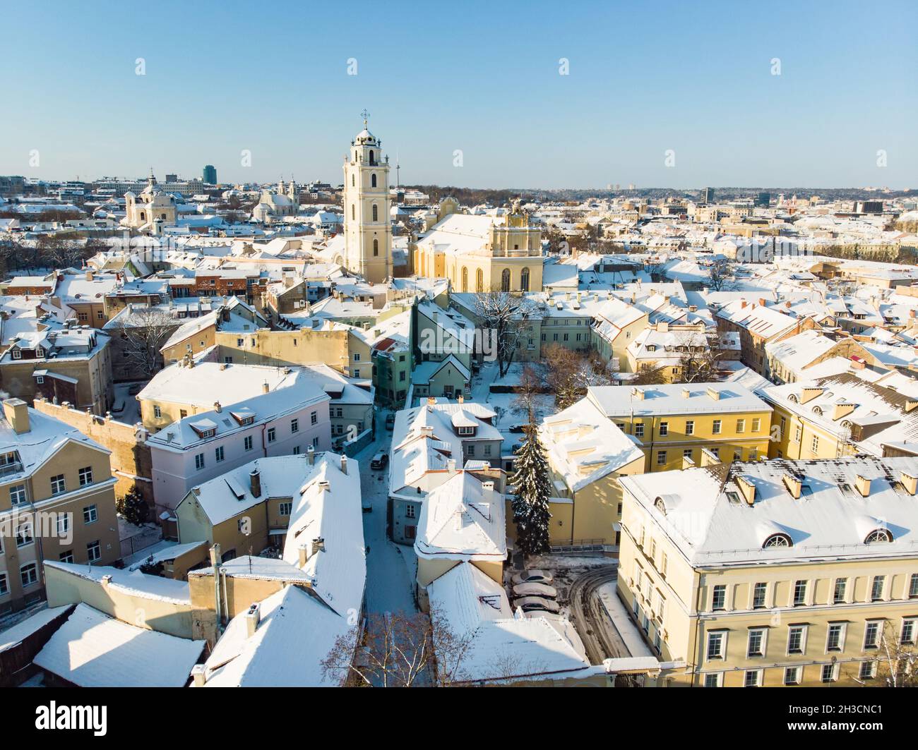 Beautiful Vilnius city panorama in winter with snow covered houses ...