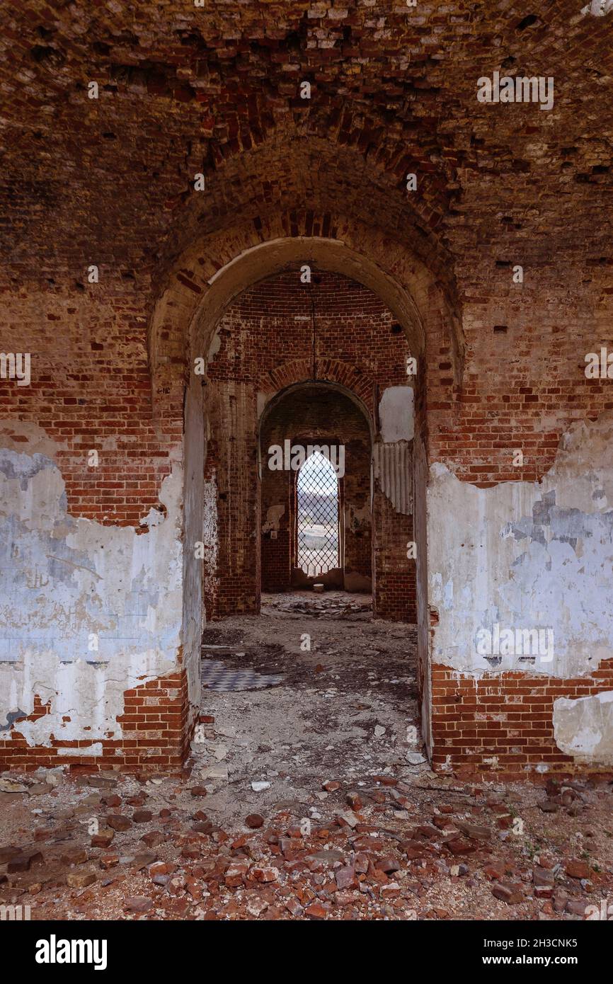 Inside the old ruined red brick church in gothic style Stock Photo - Alamy