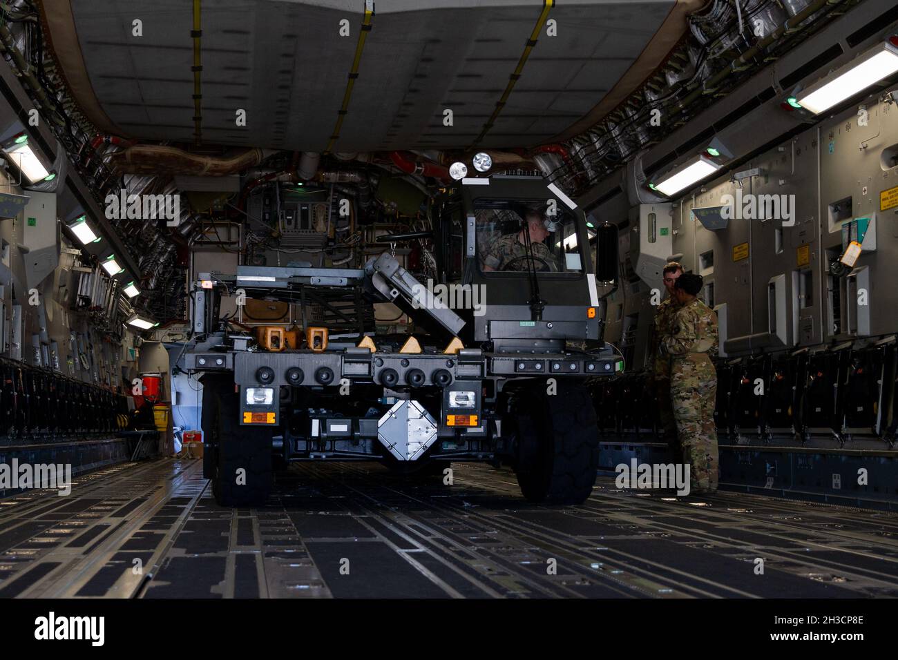 U.S. Marines with Combat Logistics Company 21 and U.S. Airmen assigned ...