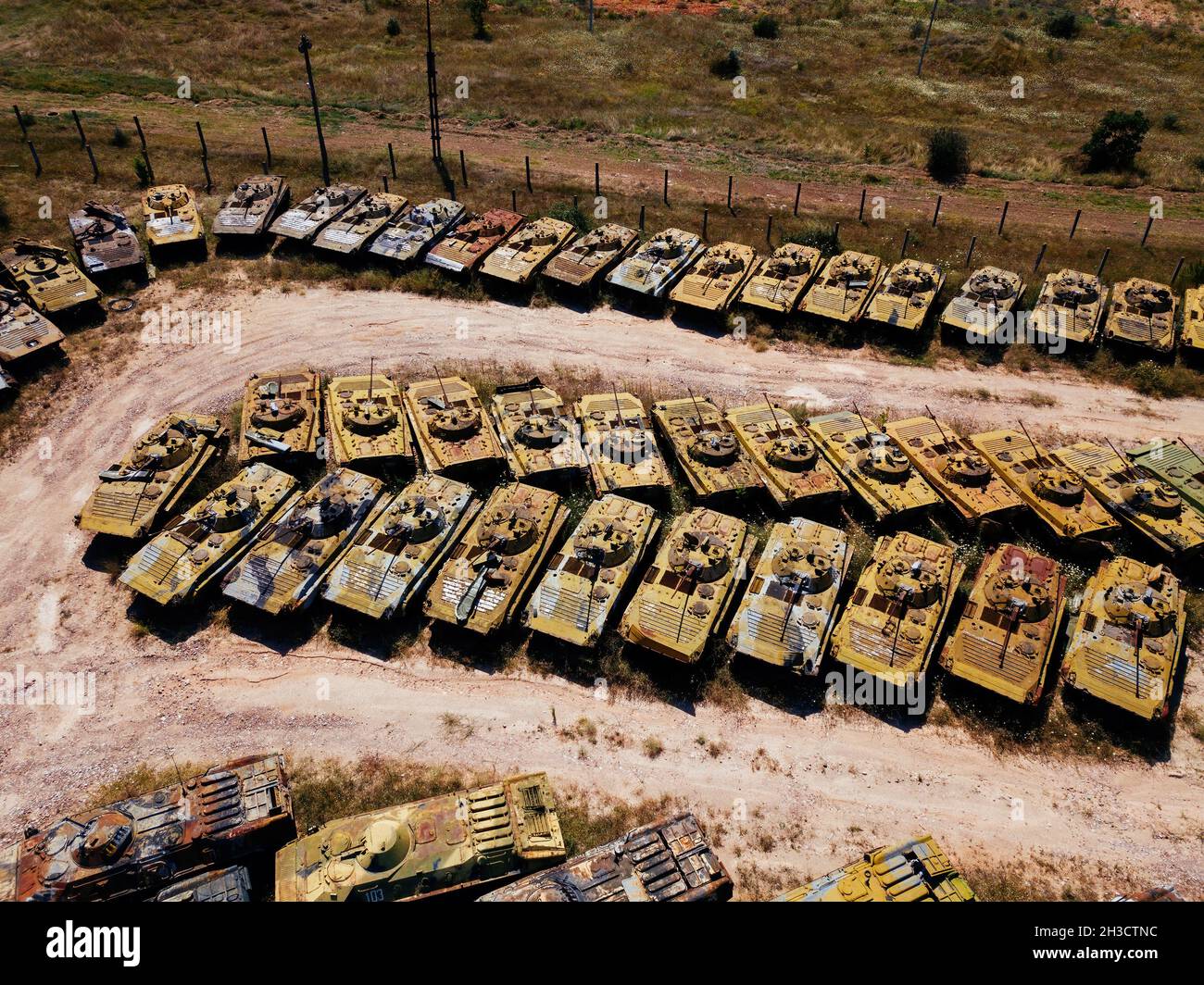 Old rusty broken Russian military vehicles in industrial area, aerial view Stock Photo - Alamy