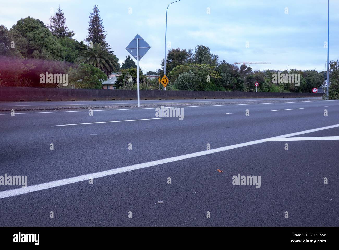 Highway and passing traffic blurred in motion, Takitimu Drive ...