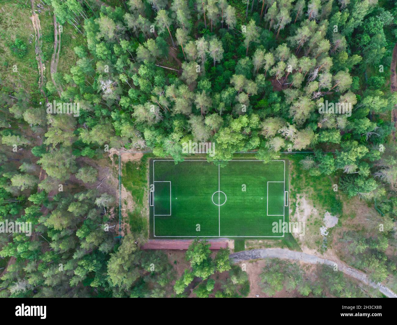 Aerial drone view of football soccer pitch field, green grass summer ...