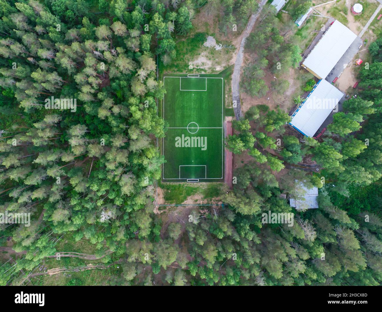 Aerial drone view of football soccer pitch field, green grass summer ...
