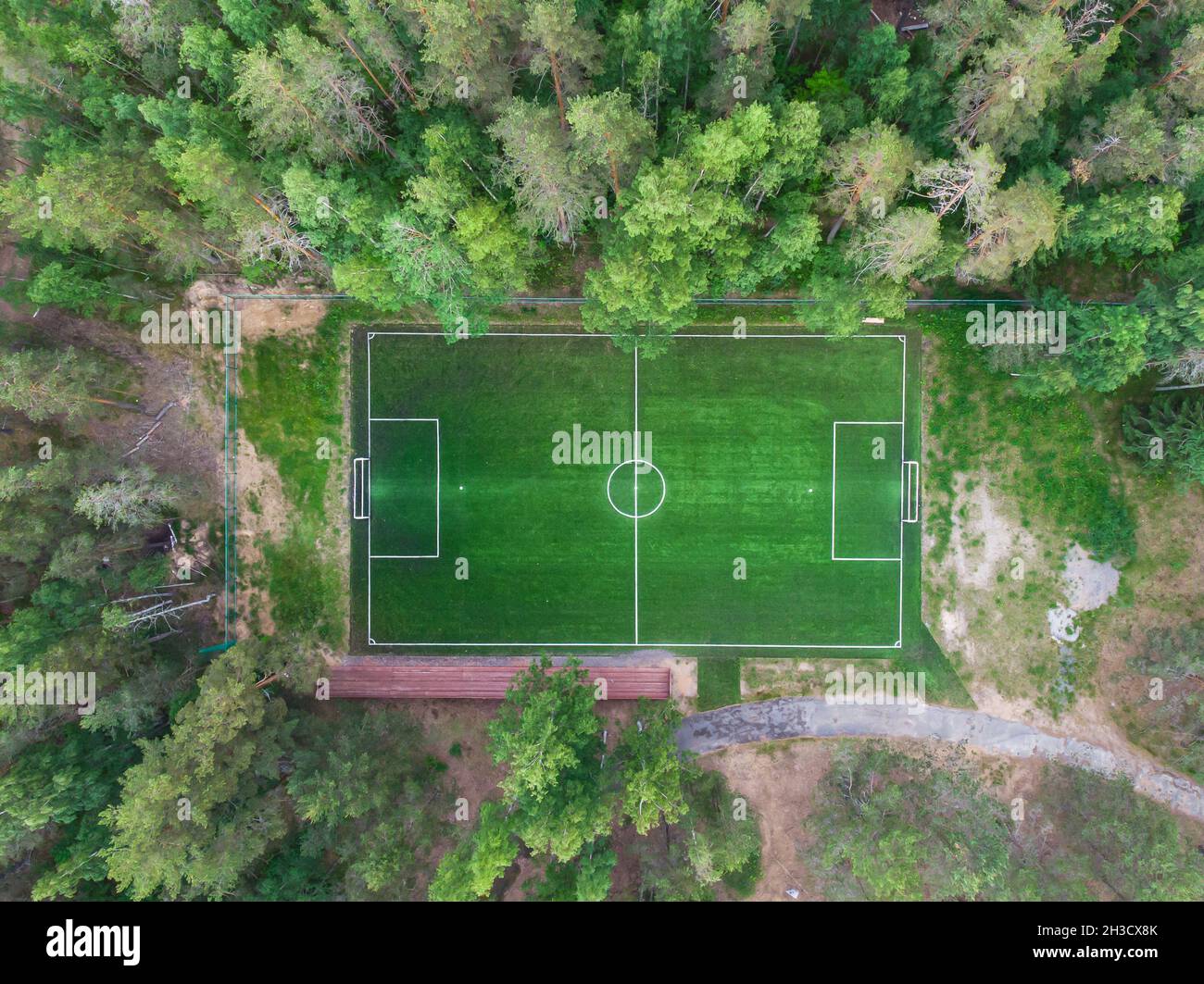 Aerial drone view of football soccer pitch field, green grass summer ...