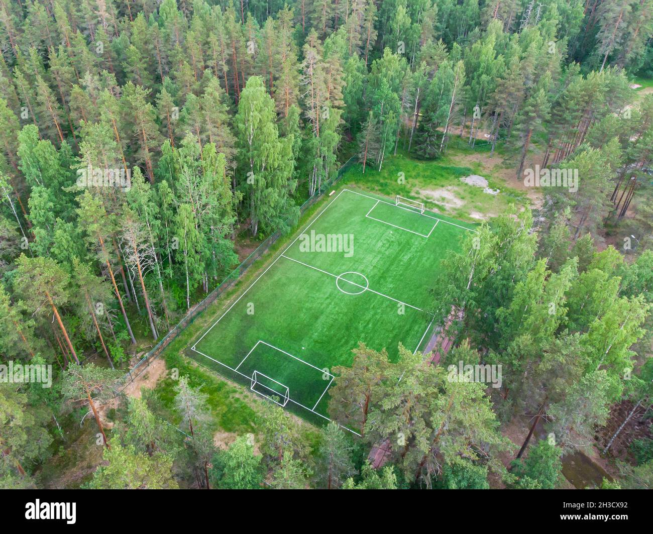 Aerial drone view of football soccer pitch field, green grass summer ...