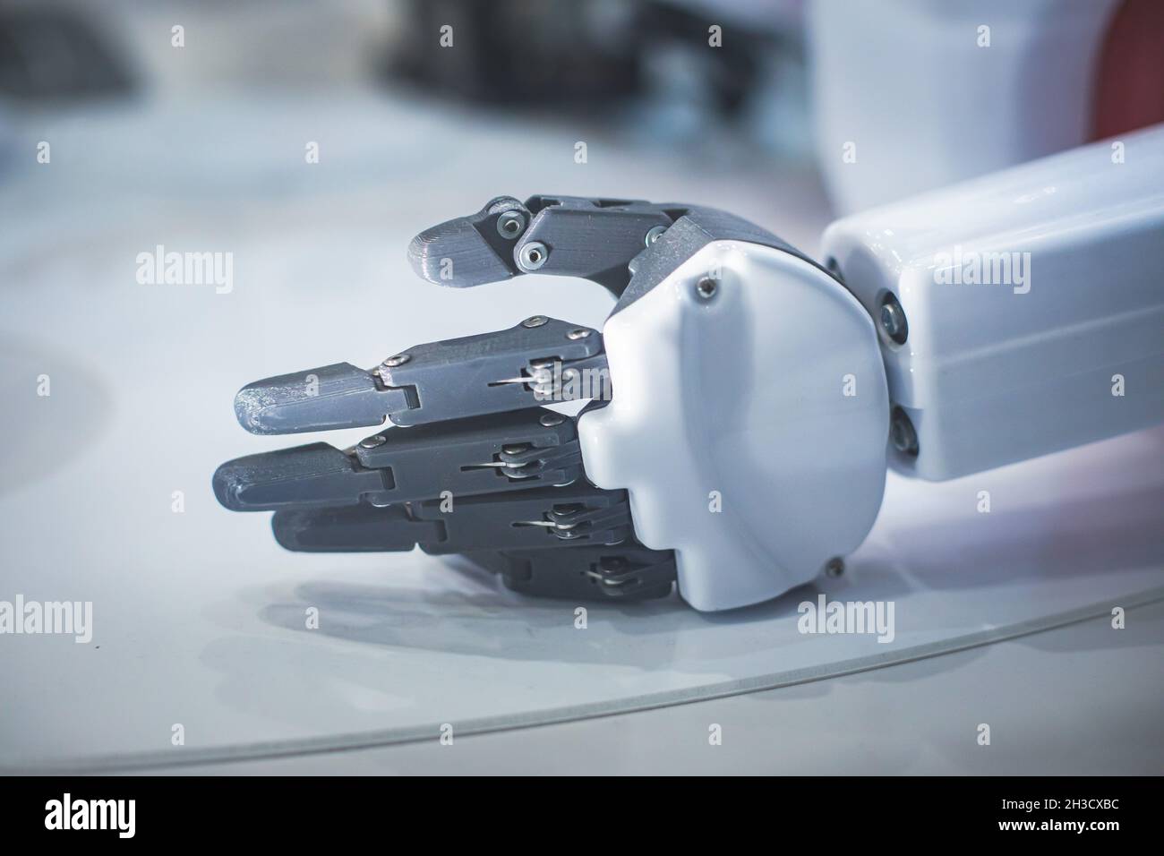 Hydraulic mechanical cyborg robot arm in hand shake gesture, robotized ...