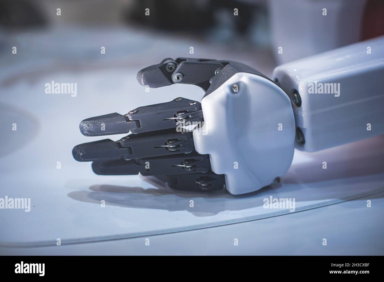 Hydraulic mechanical cyborg robot arm in hand shake gesture, robotized ...