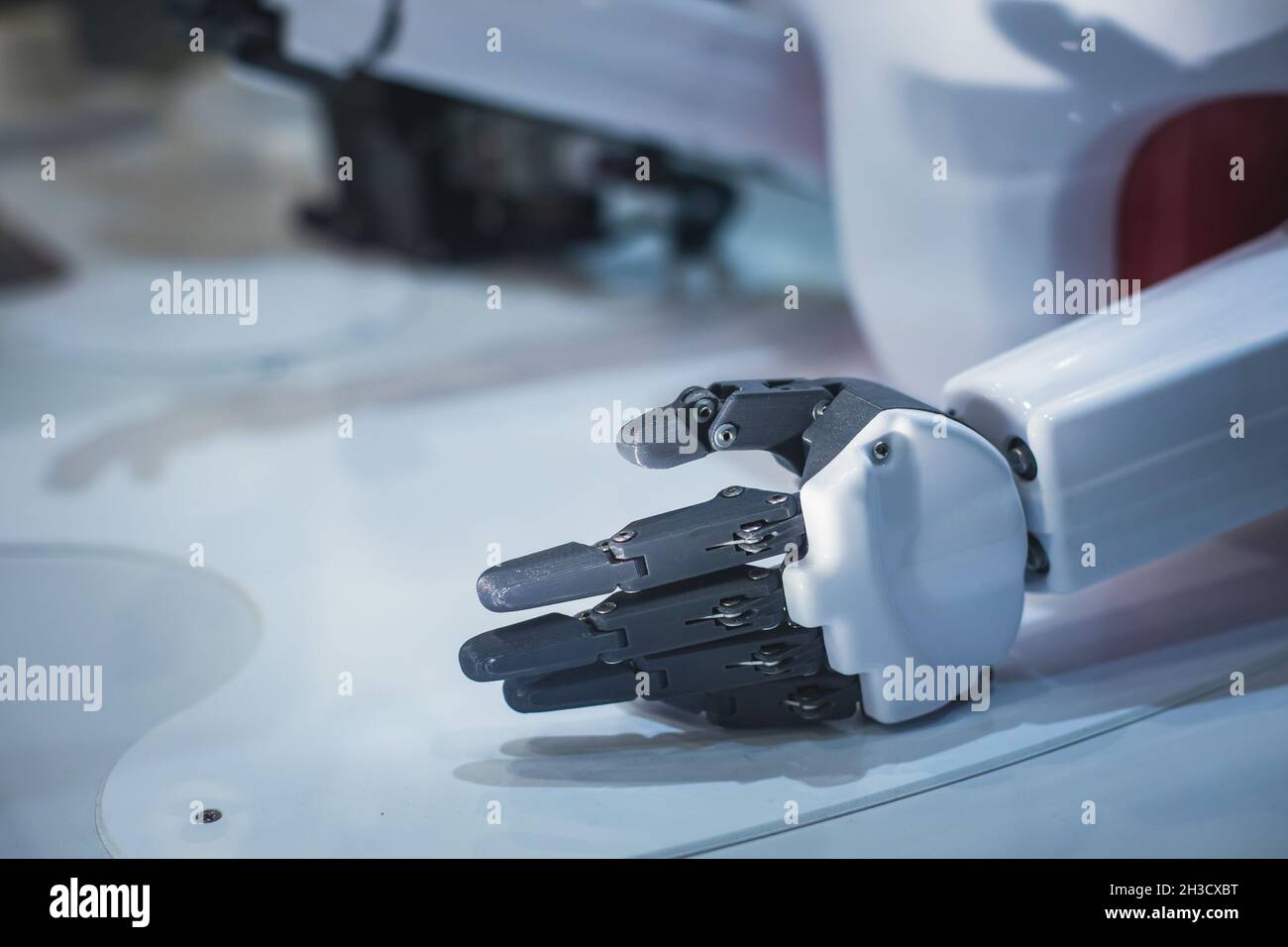 Hydraulic mechanical cyborg robot arm in hand shake gesture, robotized ...