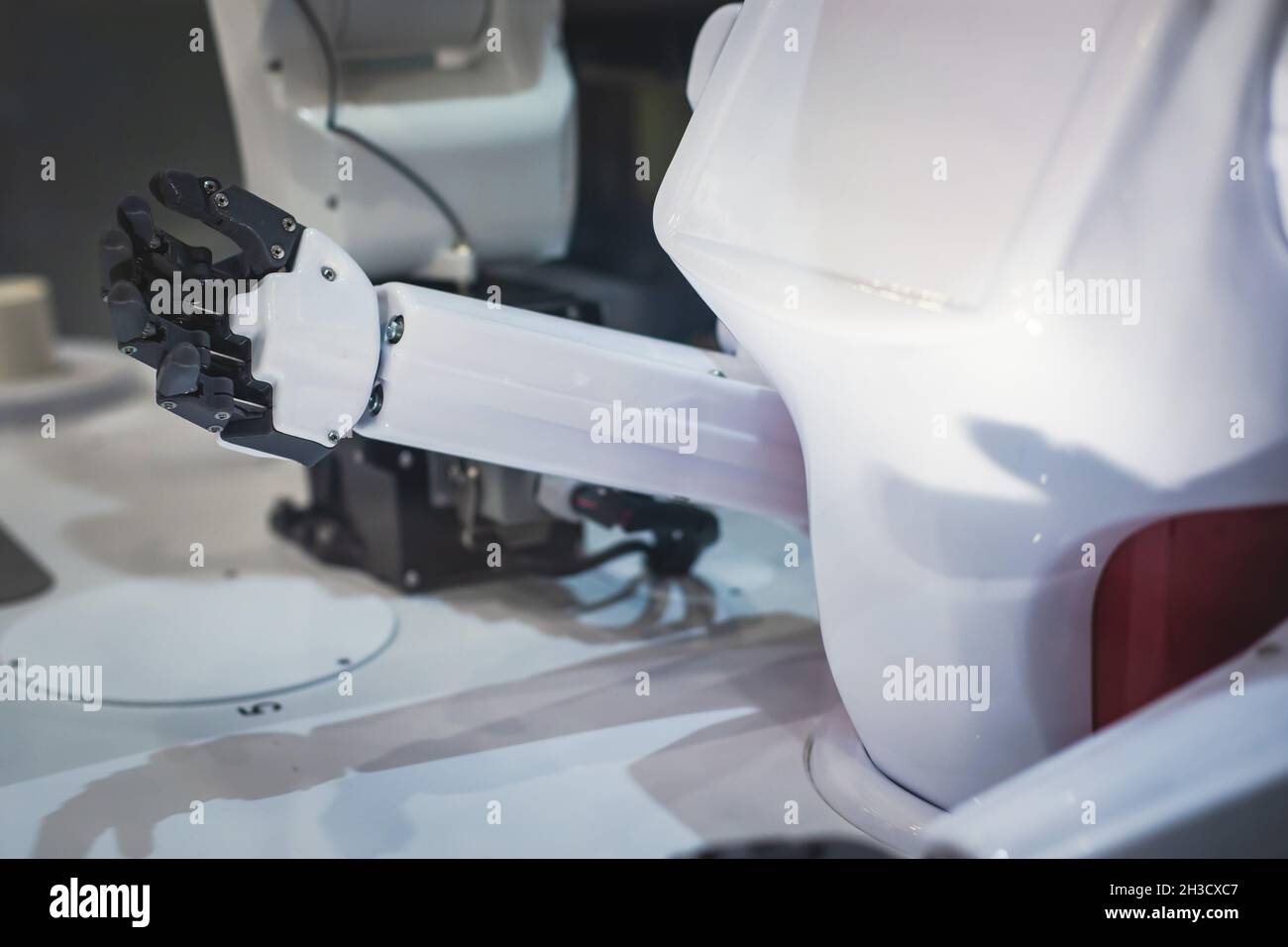 Hydraulic mechanical cyborg robot arm in hand shake gesture, robotized ...