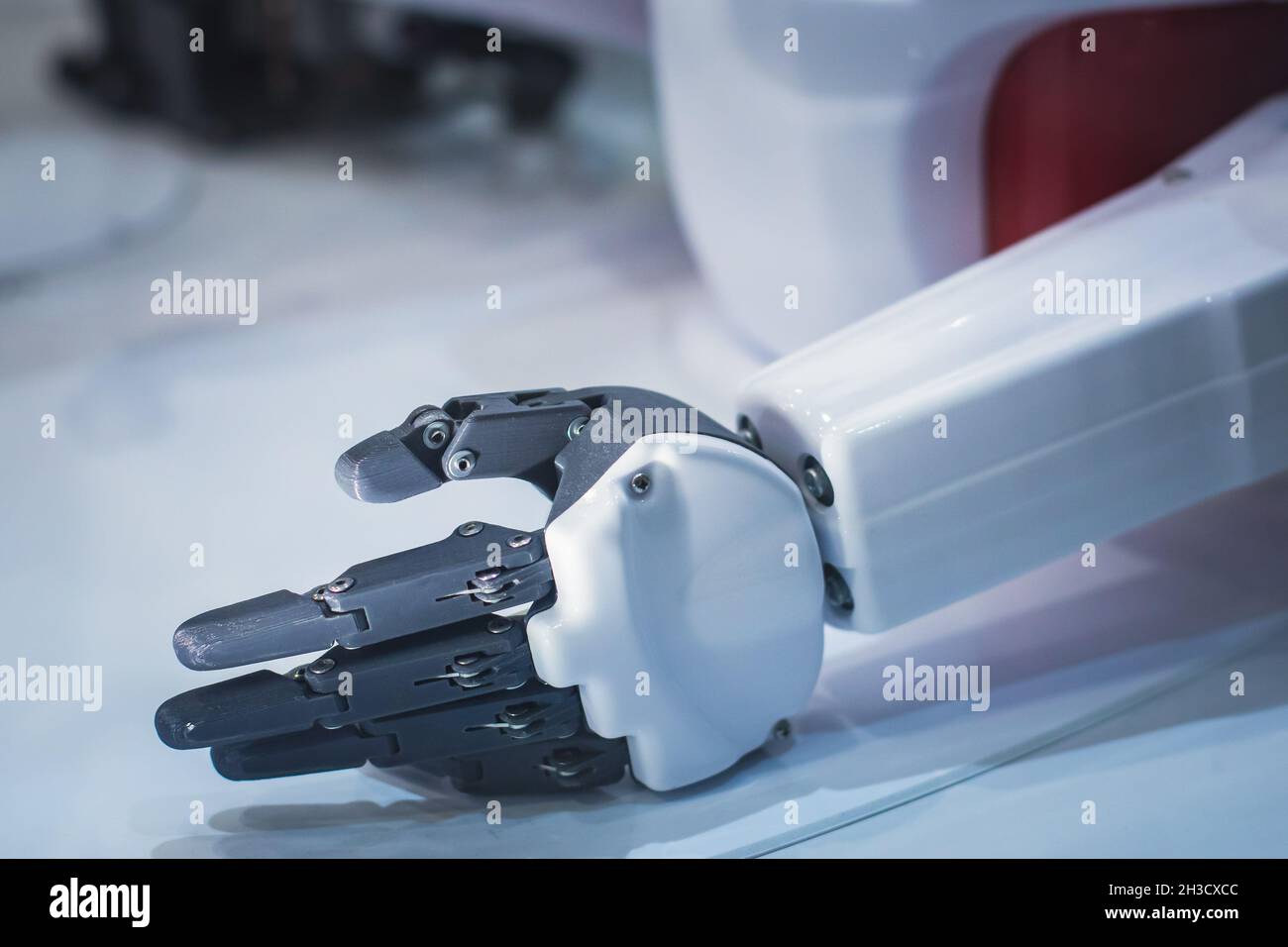 Hydraulic mechanical cyborg robot arm in hand shake gesture, robotized ...