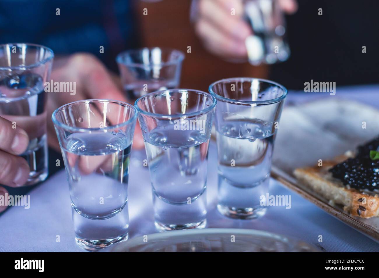 Vodka shots cheers hi-res stock photography and images - Alamy