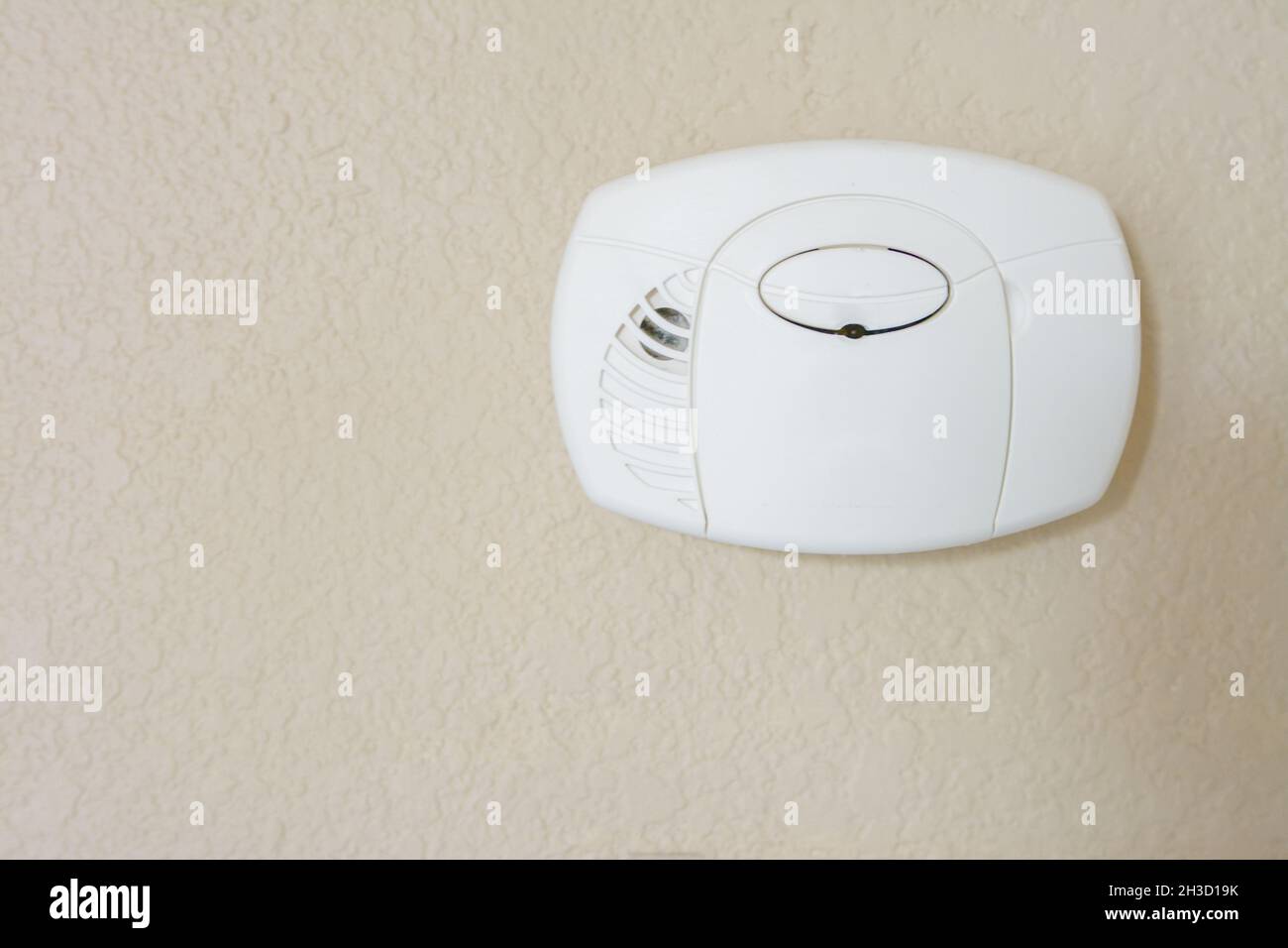 Fire alarm Smoke detector on the wall Stock Photo - Alamy