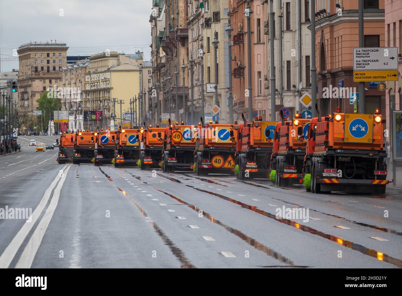 Moscow, Russia - May 9, 2021: A column of sweeper cars after the May 9 ...