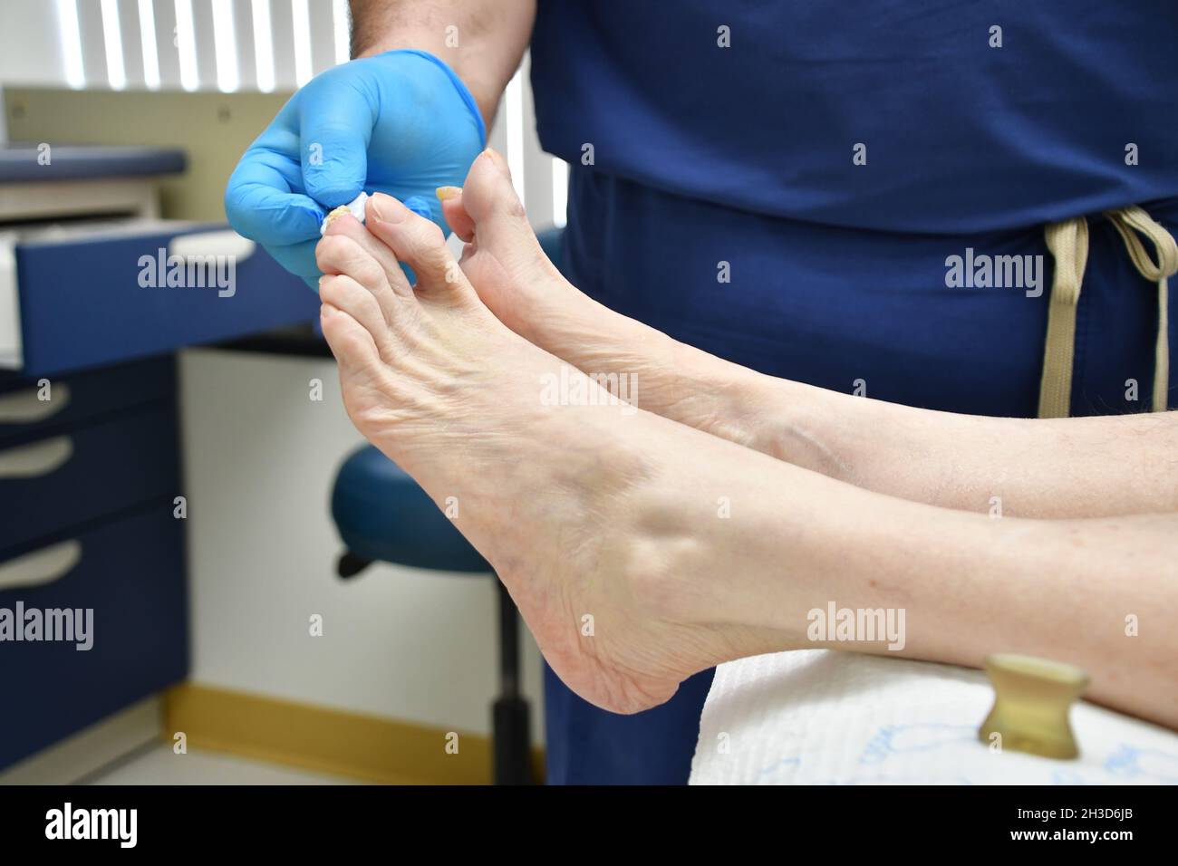 Female Geriatric Podiatrist doctor visit Stock Photo - Alamy