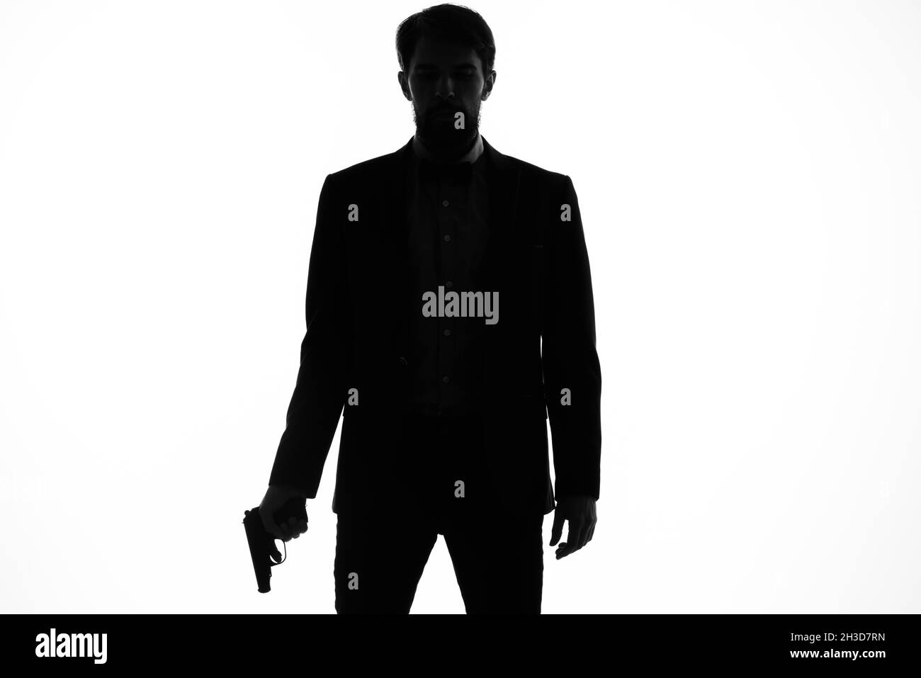 businessmen with a pistol in hand crime hand gesture posing studio ...