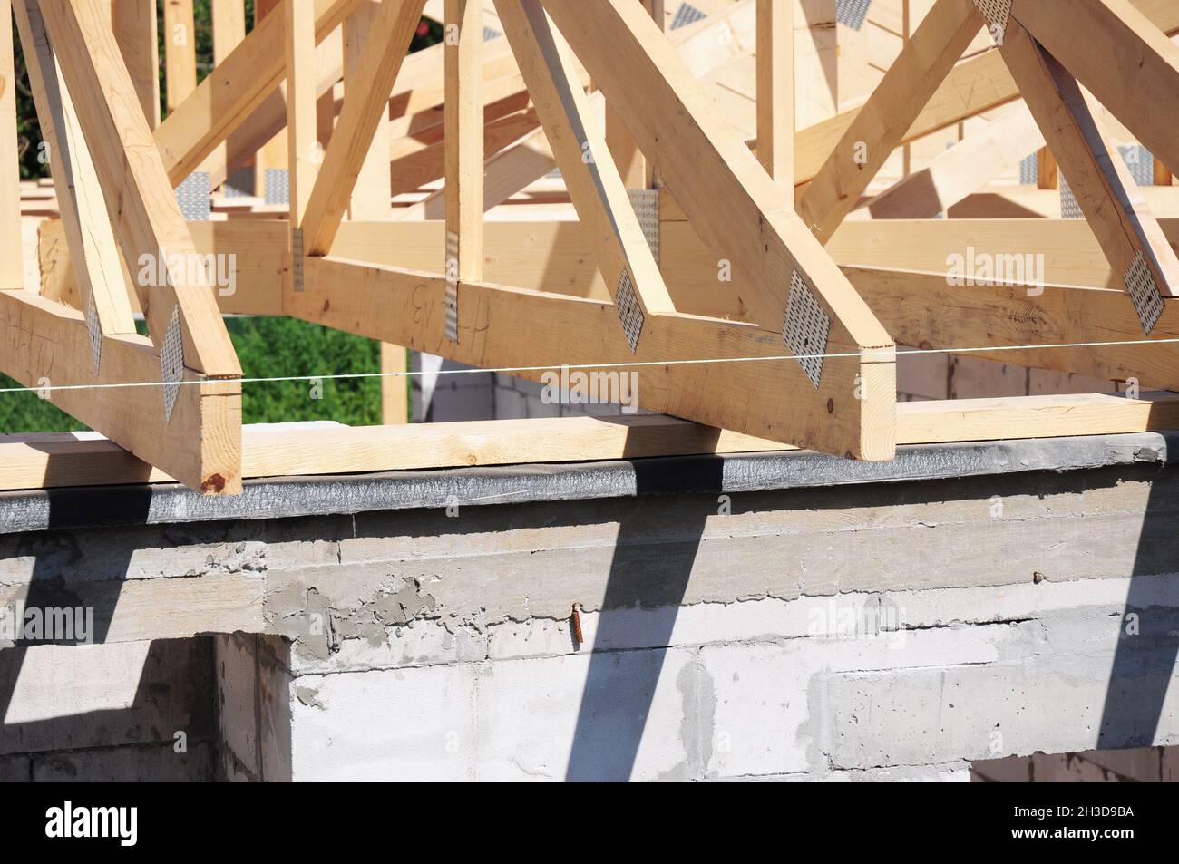 Roofing construction with measuring and waterproofing wooden beams ...