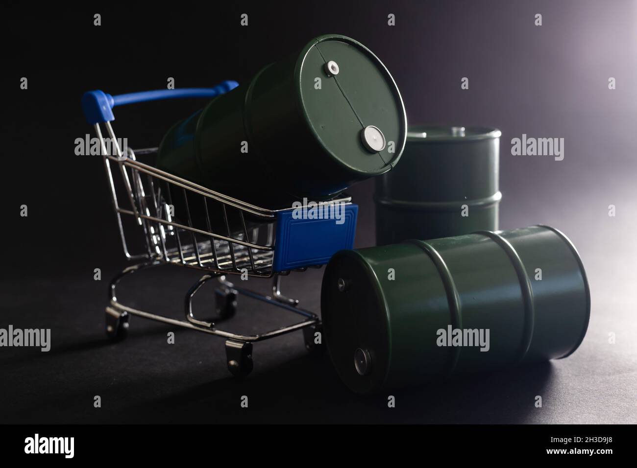 Miniatures toy barrels on a shopping cart Stock Photo - Alamy