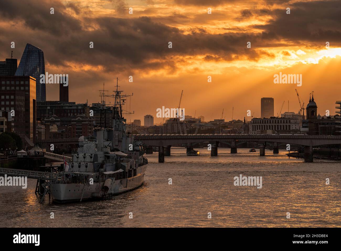 Sunset on the River Thames, looking towards London Bridge from Tower ...