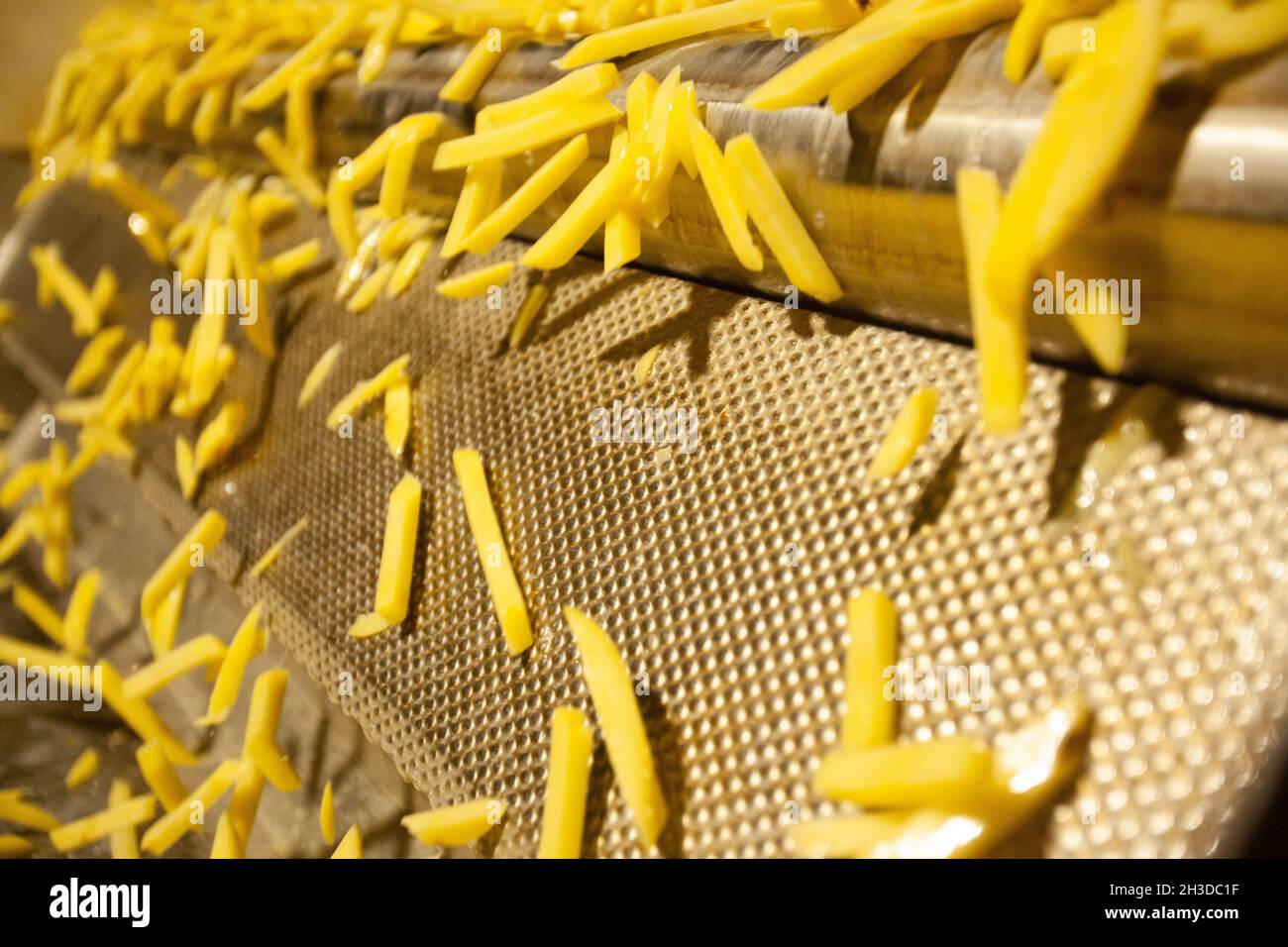 Production line of a potato factory. French fries - fast food Stock ...