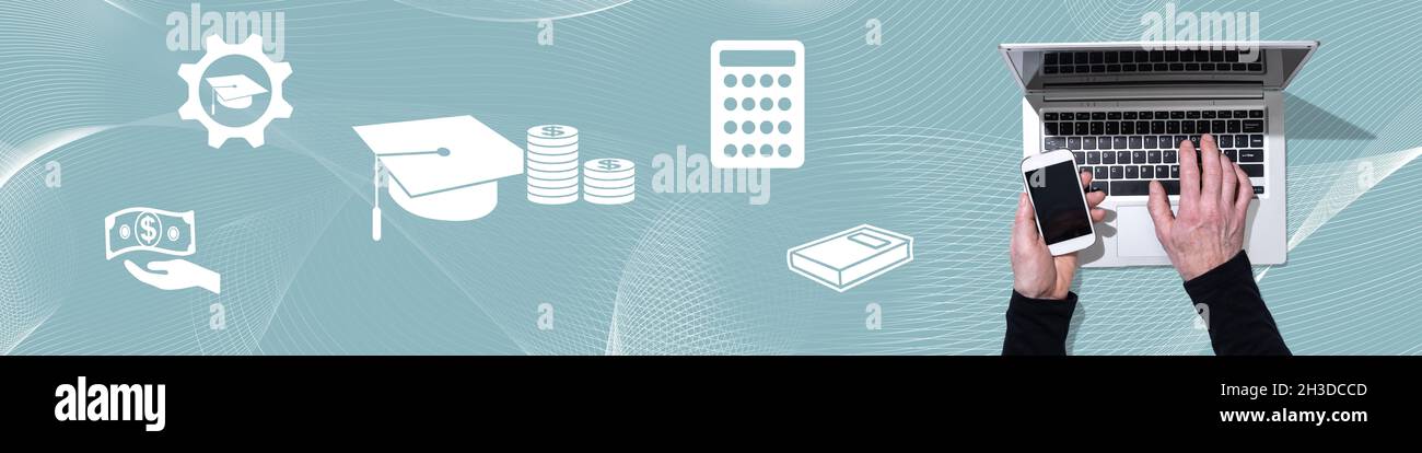 Top view of hands using laptop and mobile phone with symbol of fafsa ...