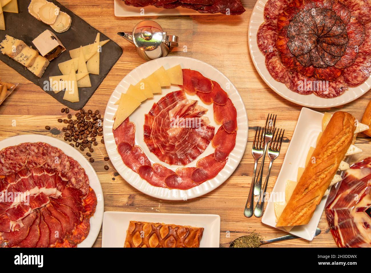 Special cold cuts dishes to serve as tapas. Acorn-fed Iberian ham ...