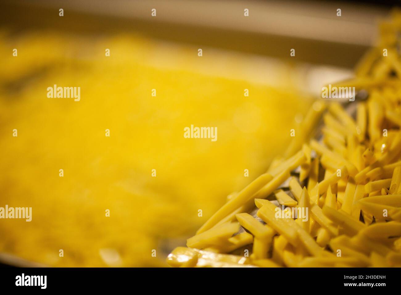 Production line of a potato factory. French fries - fast food Stock ...