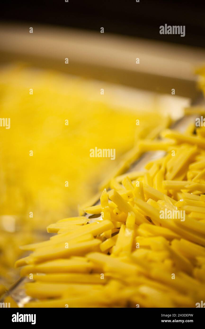 Production line of a potato factory. French fries - fast food Stock ...