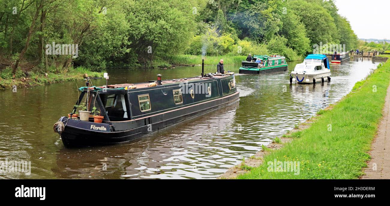 Colourful canal boats brightening up a dull day hi-res stock ...