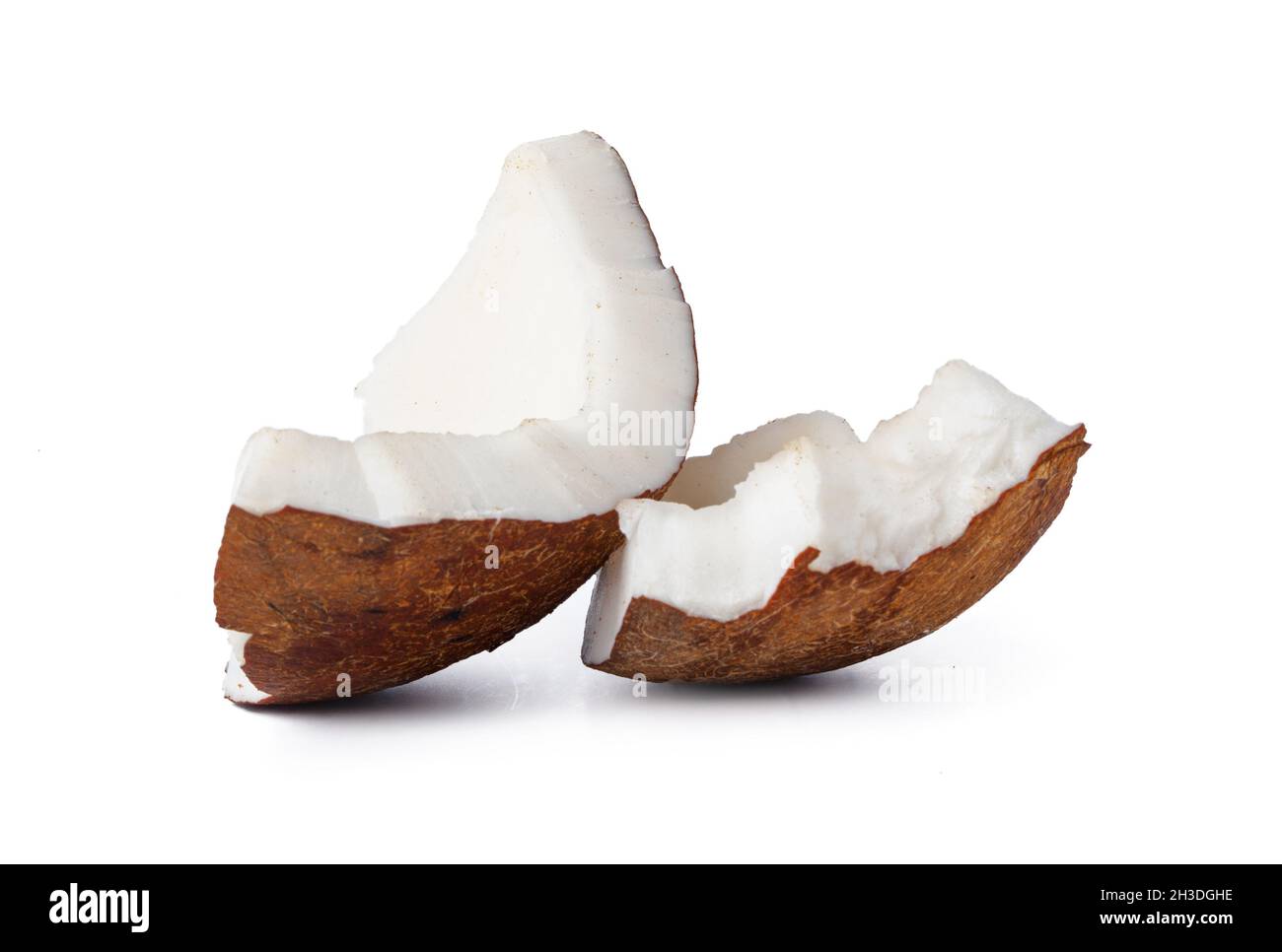 Coconut pieces isolated on a white background Stock Photo - Alamy
