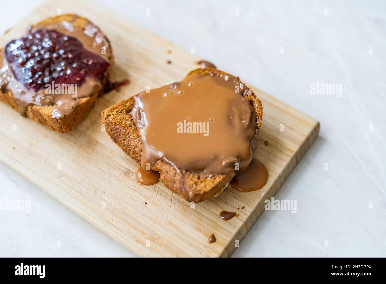 Peanut Butter with Dulce de Leche Milk Jam with Toast Bread. Ready to ...