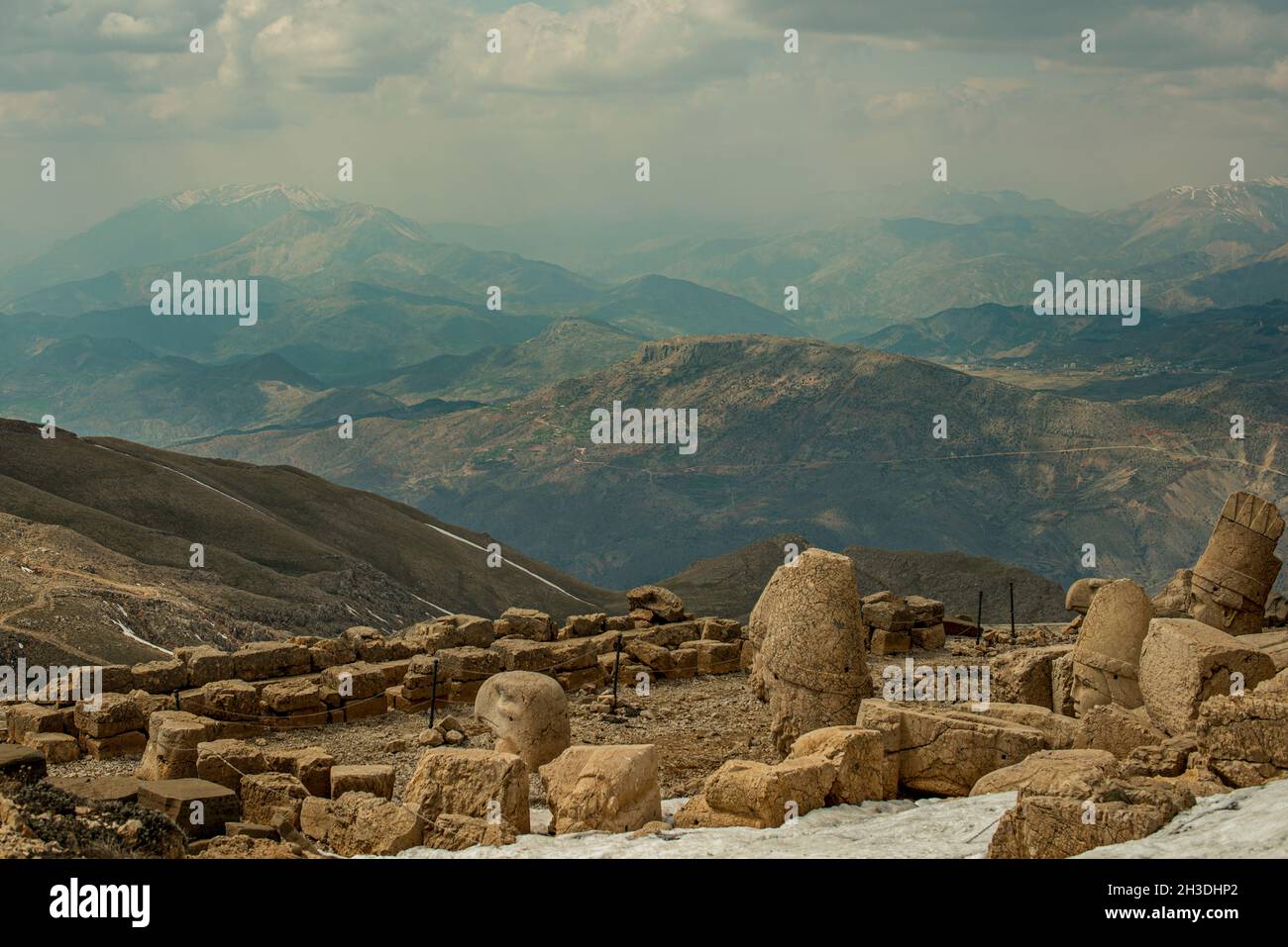 Heads of gods and mythological figures on top of the mountain of the ...