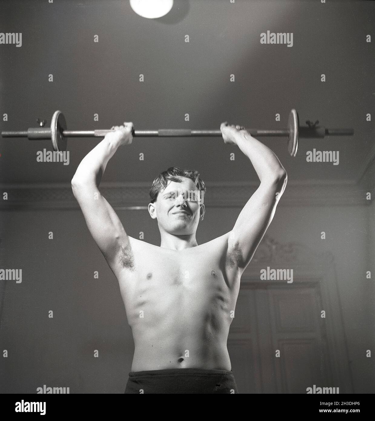 Vintage weights exercising hi-res stock photography and images - Alamy