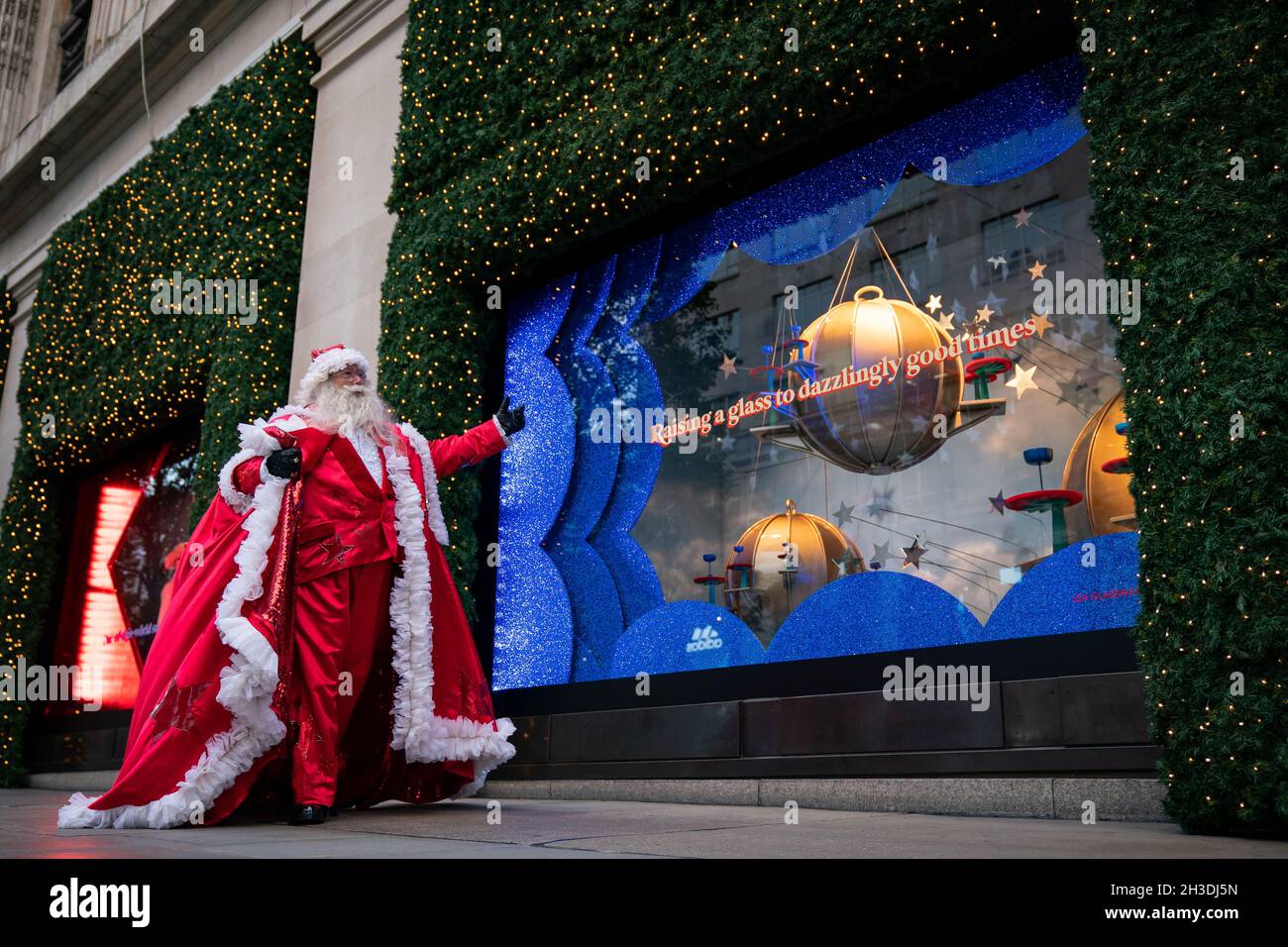 A man dressed as Santa Claus outside Selfridges in London as the ...