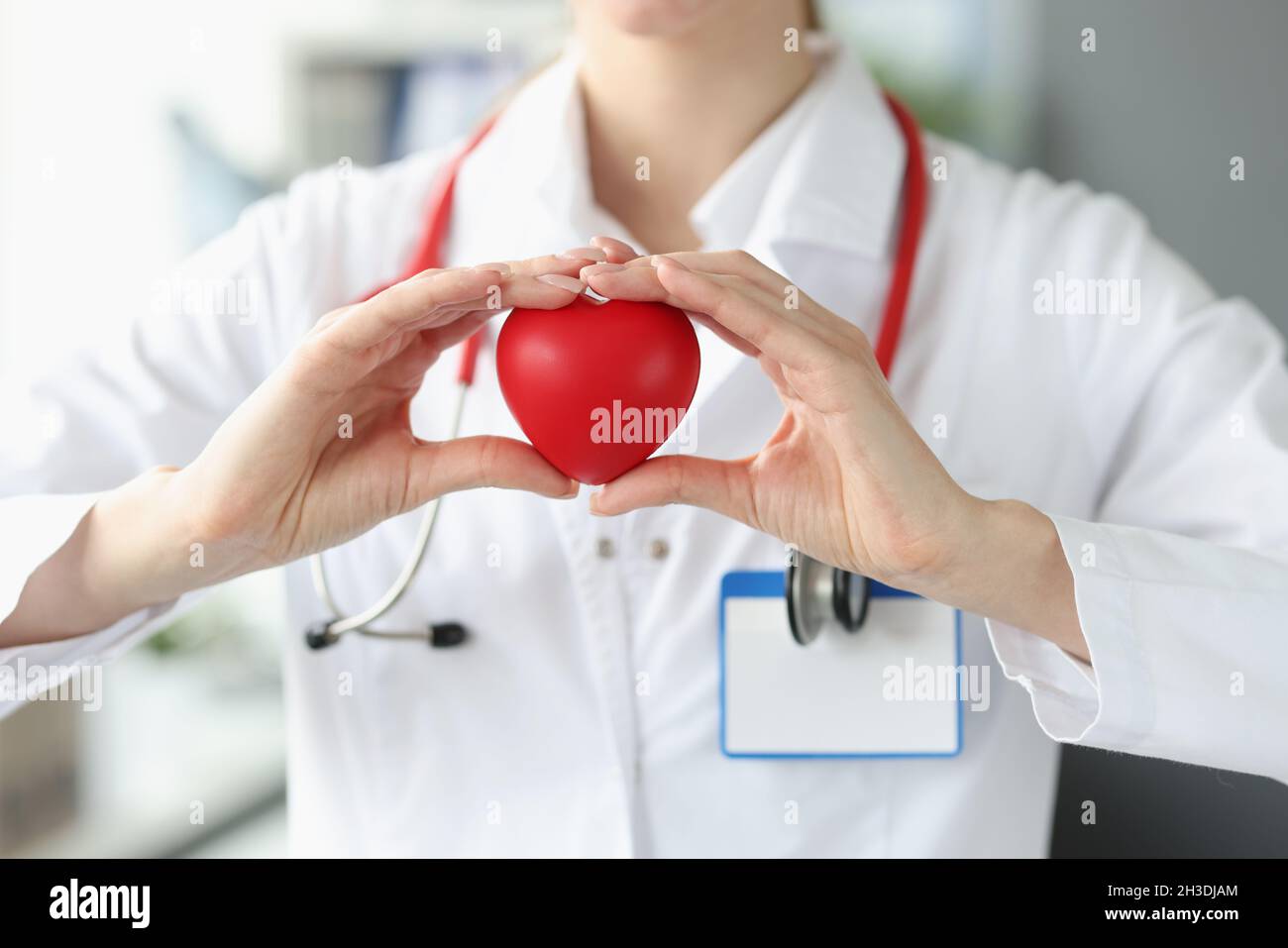 Nurse holding human heart hi-res stock photography and images - Alamy