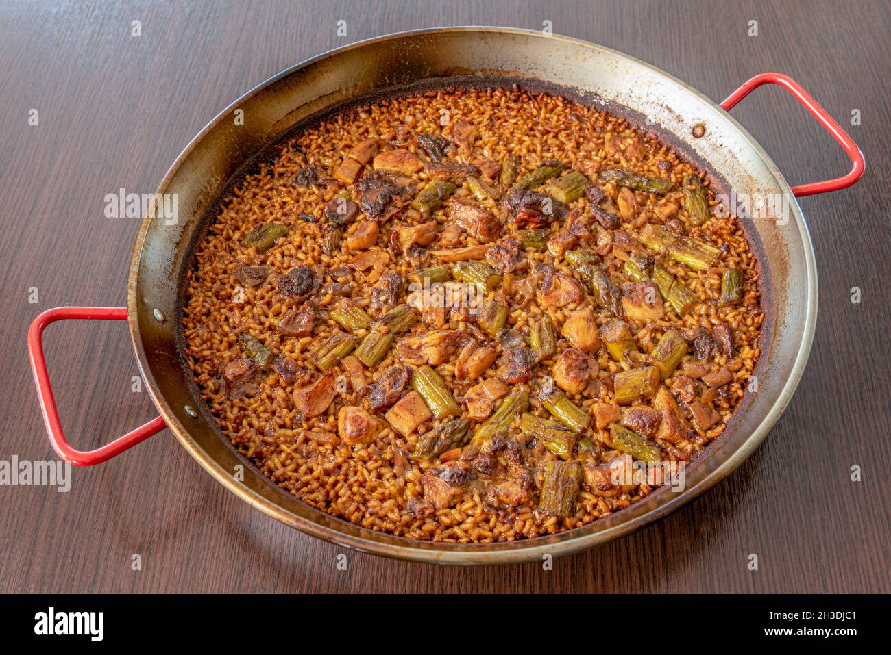 Spanish paella of boletus mushroom with wild asparagus, socarrat rice ...