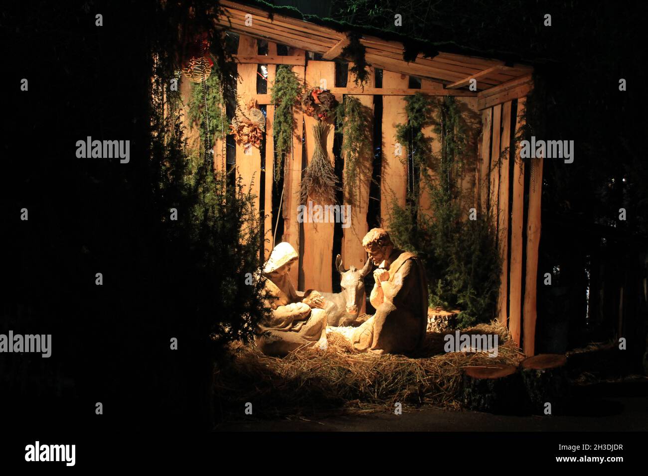 the big jesus christ nativity scene in the dark Stock Photo - Alamy