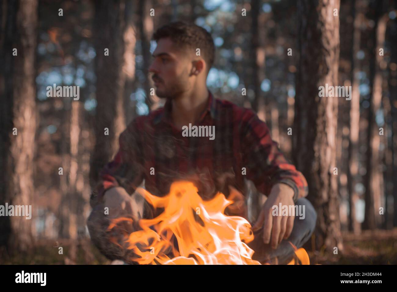 Guy sitting on bonfire hi-res stock photography and images - Alamy