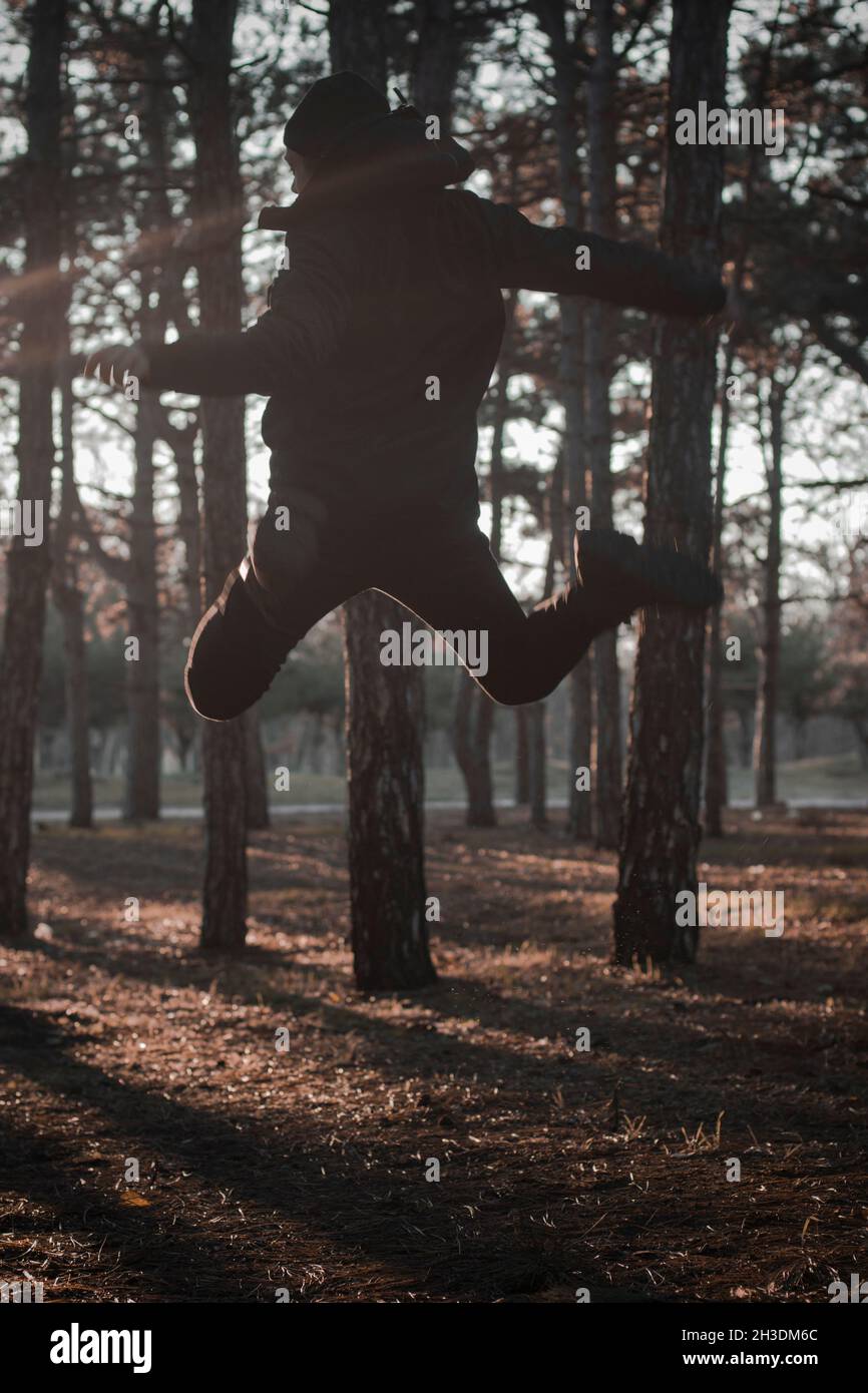 the guy is facing the light, a contrast photo. guy on the way Stock ...