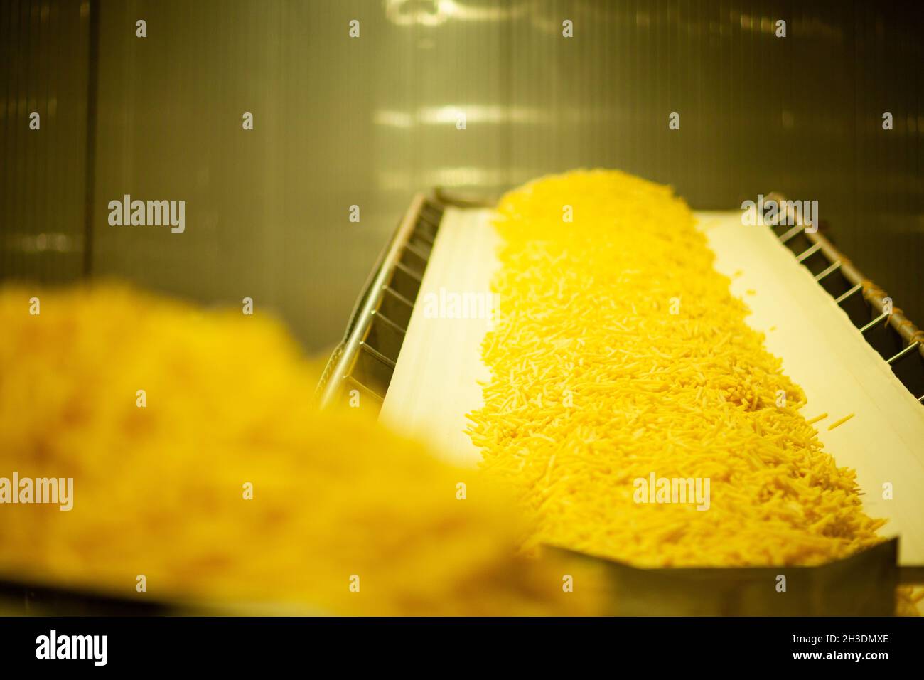 Production line of a potato factory. French fries - fast food Stock ...