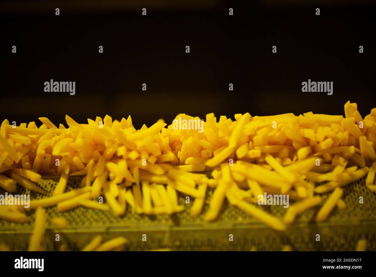 Production line of a potato factory. French fries - fast food Stock ...